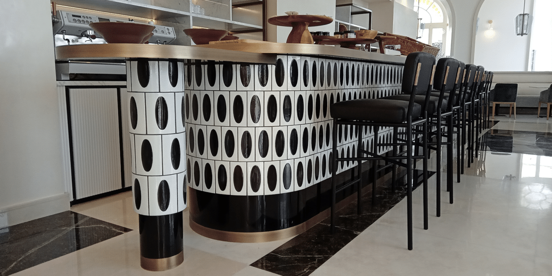 Ranieri decorates the entrance of the trade show with lava stones